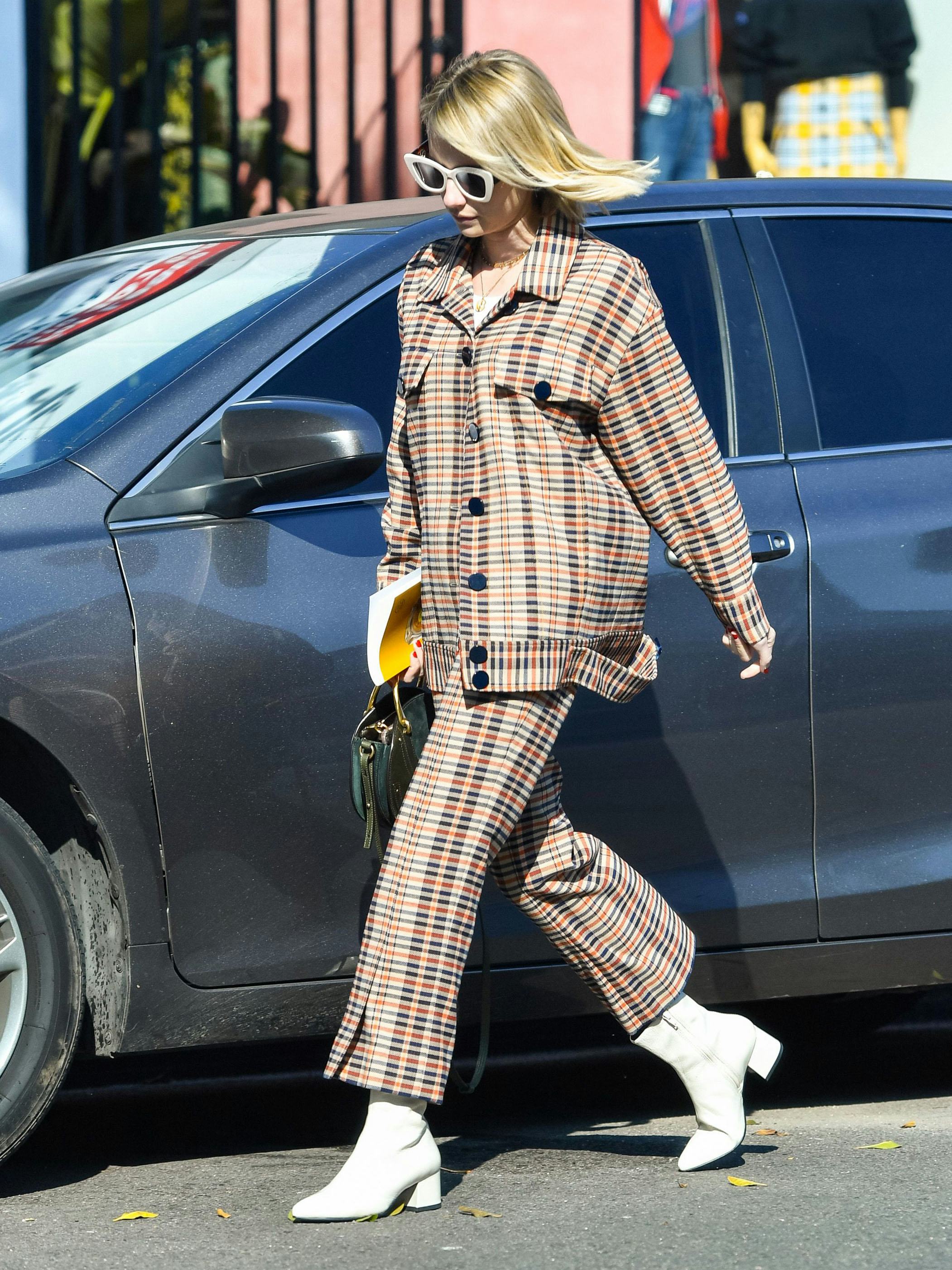 Emma Roberts’ White Ankle Boots Are Everything You’d Want In A Go-To Shoe