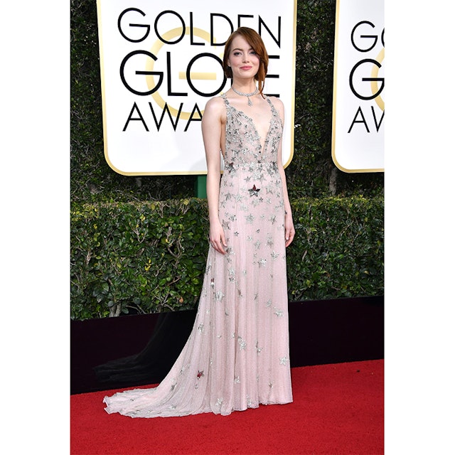 Emma Stone’s Sophisticated Dress Is An Unexpected Trend For Party Season
